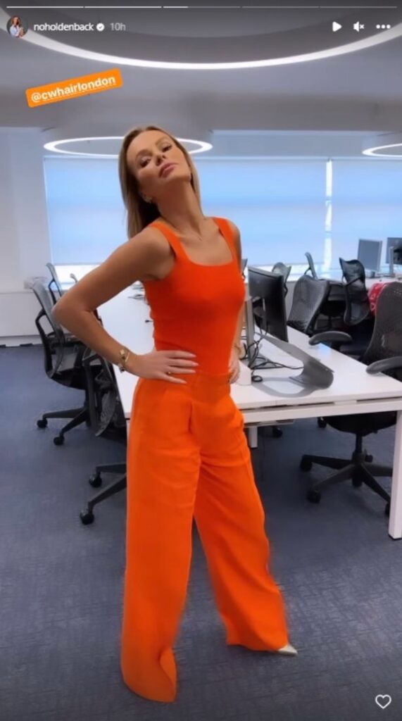 Amanda Holden Removes Her Bra And Wears A Low Cut Orange Top In A