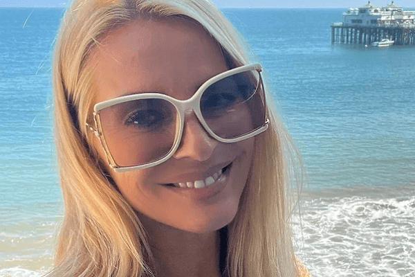 Tess Daly Wows While On Holiday In A Plunging White Swimsuit